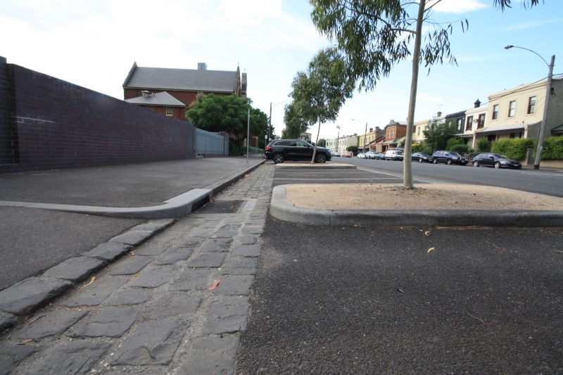 Outstand with surrounding permeable pavement | City of Melbourne